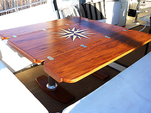 Teak and Plastic Cockpit Tables for sailboats | tag line
